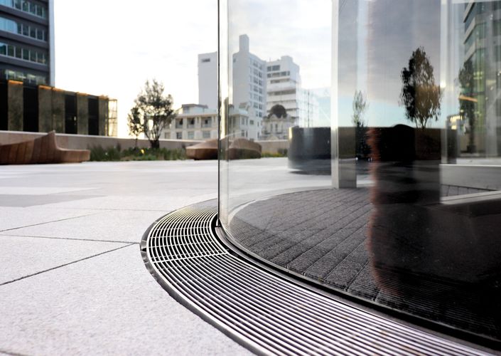 Allproof’s custom curved drainage solution for a new hotel | ArchitectureAu
